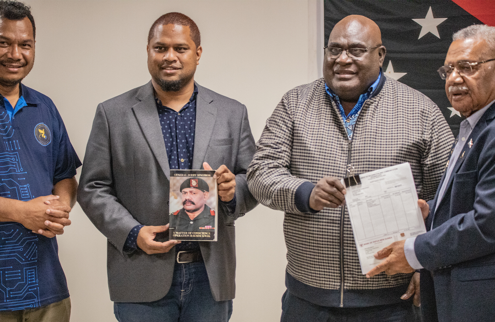 Minister Masiu presents Cheque for Copyright to Singirok’s book | DICT ...